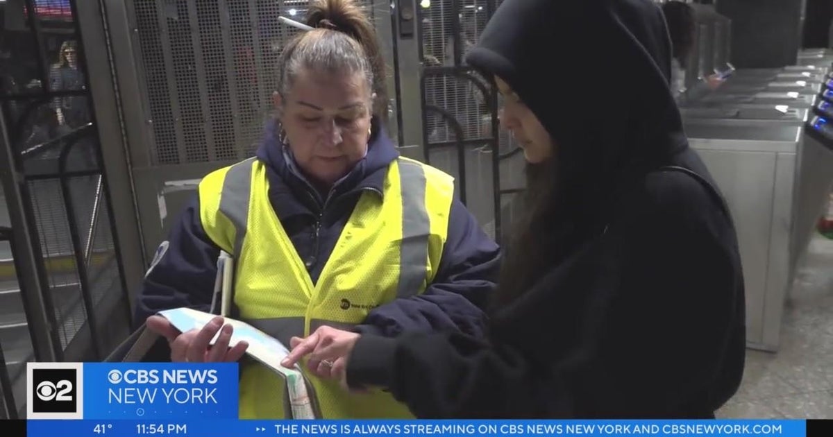 Subway station workers stepping outside their booths to help customers ...