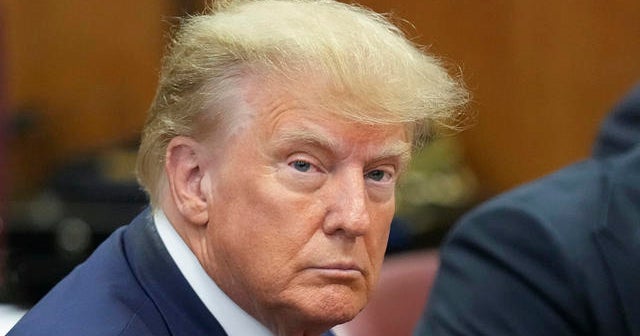 The scene inside the courtroom when Trump was charged - CBS News