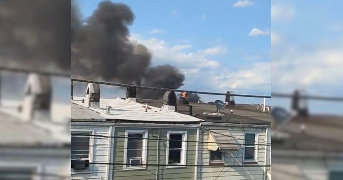 Multiple houses on fire in Southeast Baltimore, firefighters say - CBS ...