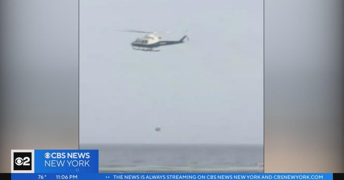 NYPD divers rescue man who jumped from Coney Island Pier - CBS New York
