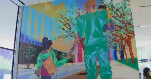 New mural unveiled at Cook County Health System - CBS Chicago