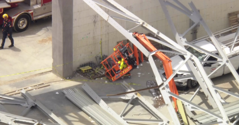 Firefighters rescue construction workers after structure collapses in ...