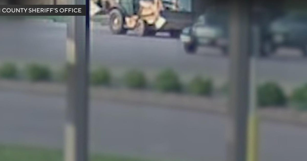 Police: Illinois man swipes backhoe to catch flight - CBS Chicago