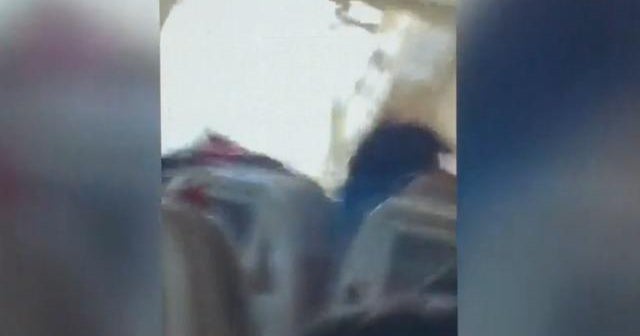 Passenger opens plane door mid-flight: "A terrifying event" - CBS News