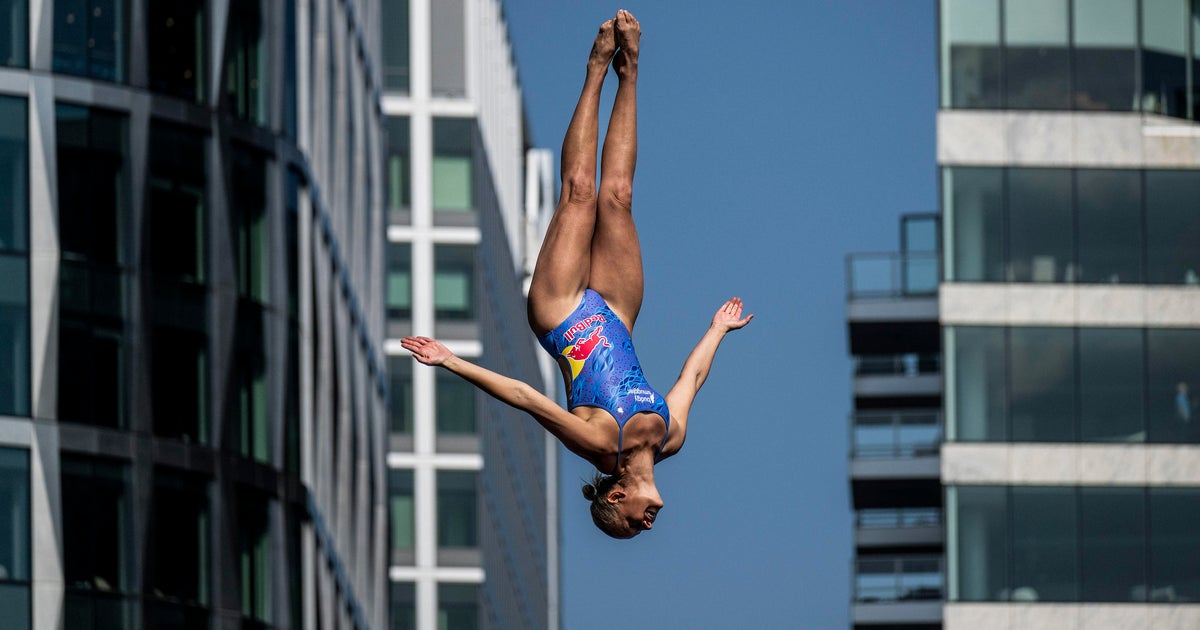 Red Bull Cliff Divers wow crowds at high-diving competition in Boston's ...