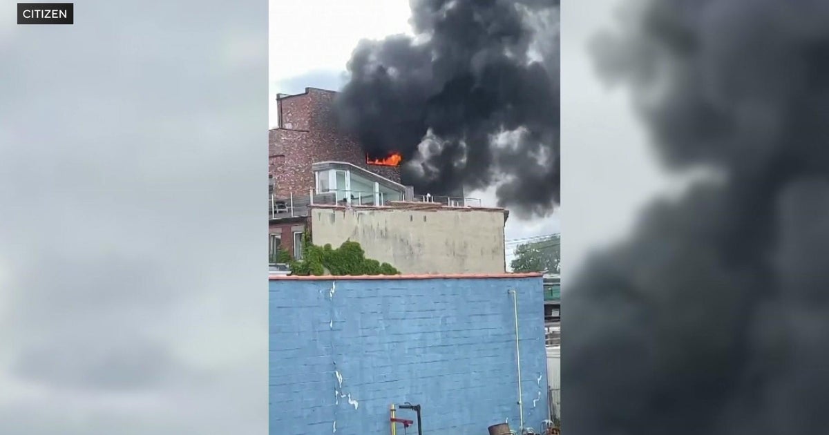 Firefighters battle blaze at Brooklyn apartment building - CBS New York
