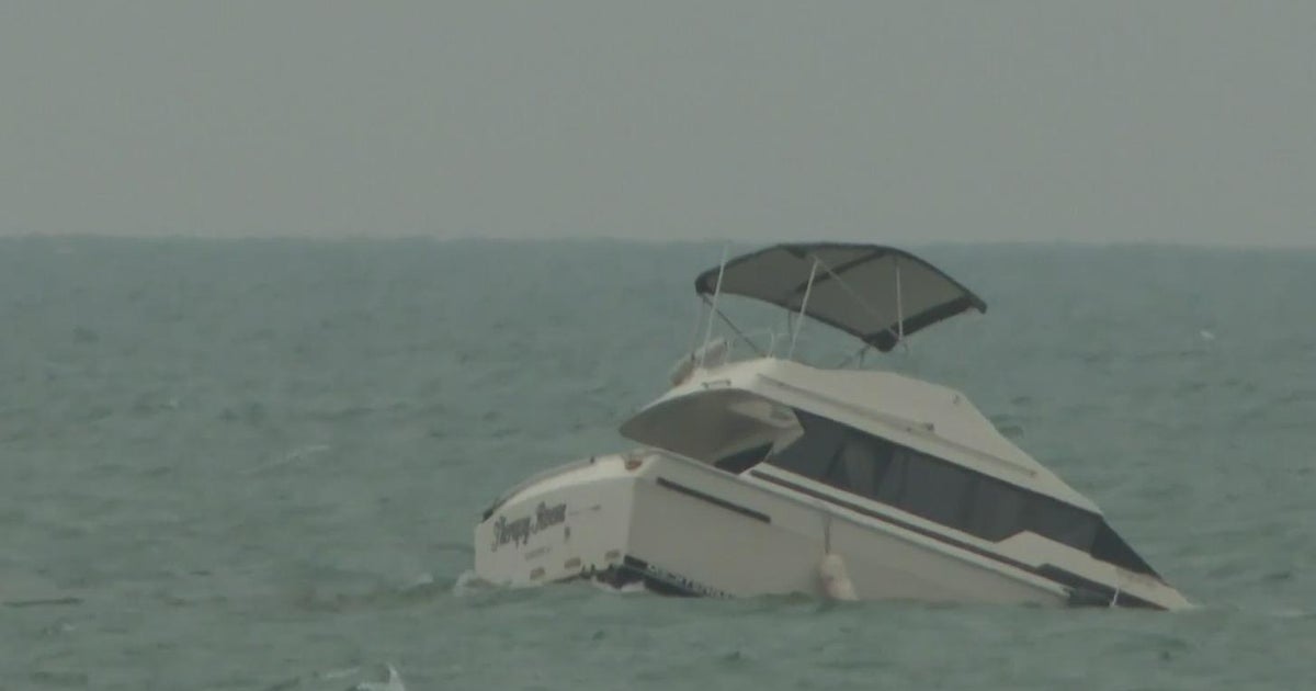 Boat remains partially sunk on Lake Michigan days after passengers ...
