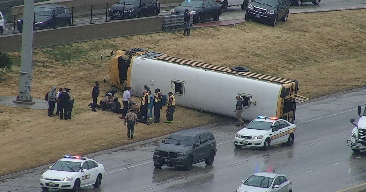 School bus flips over on side on Dan Ryan Expressway - CBS Chicago
