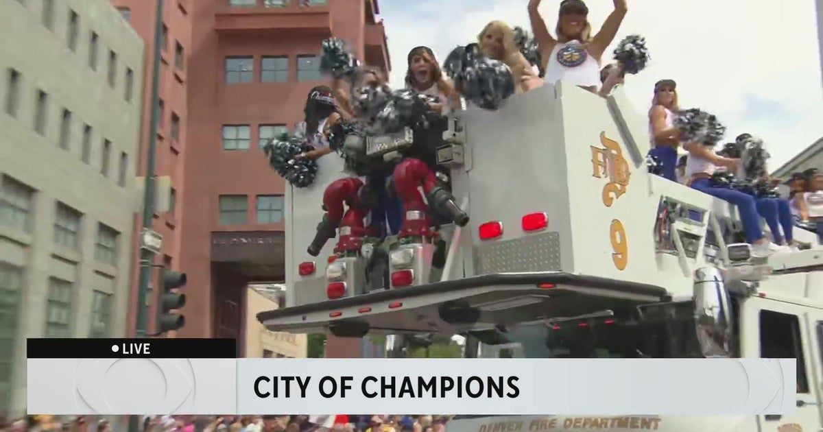 Nuggets fans cheer on their team during NBA championship parade - CBS ...