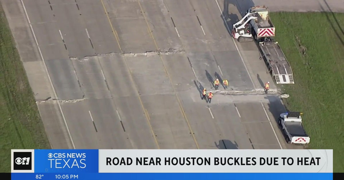 Road near Houston buckles due to heat - CBS Texas