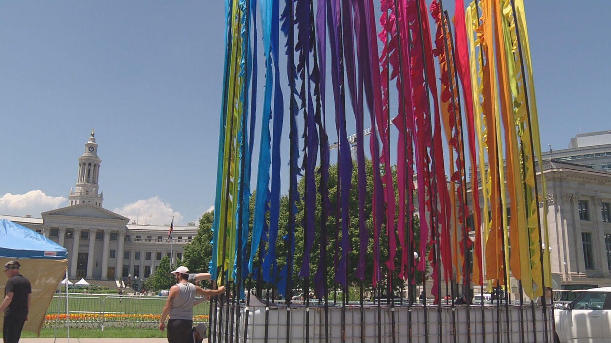 Crews set up stages and booths at Civic Center Park ahead of PrideFest - CBS Colorado