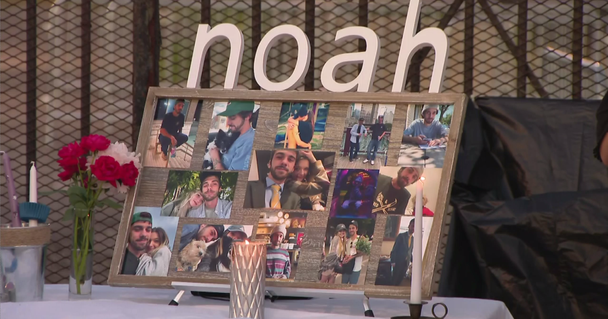 Family and friends of Noah Enos gather for vigil at Salt Shed - CBS Chicago