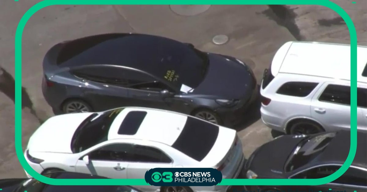 Tesla driver charged after dragging officer nearly 200 feet - CBS ...