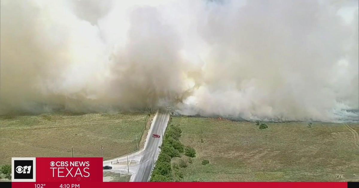 Crews work to extinguish large grass fire in Saginaw - CBS Texas