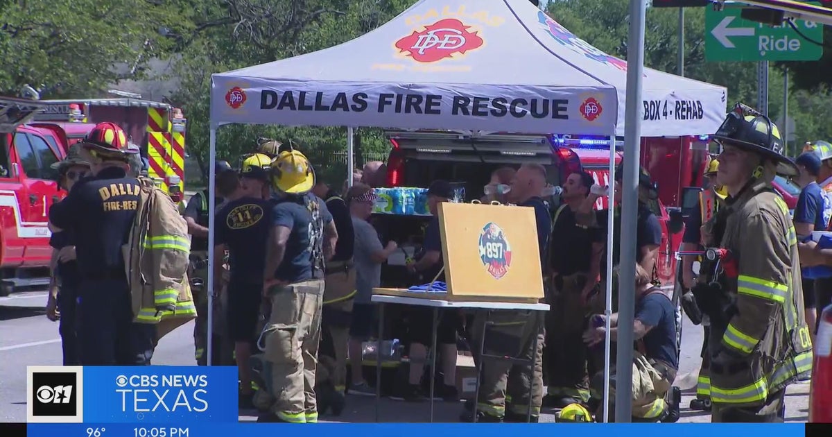 Struggling in the heat: Firefighters heed safeguards battling blaze on ...