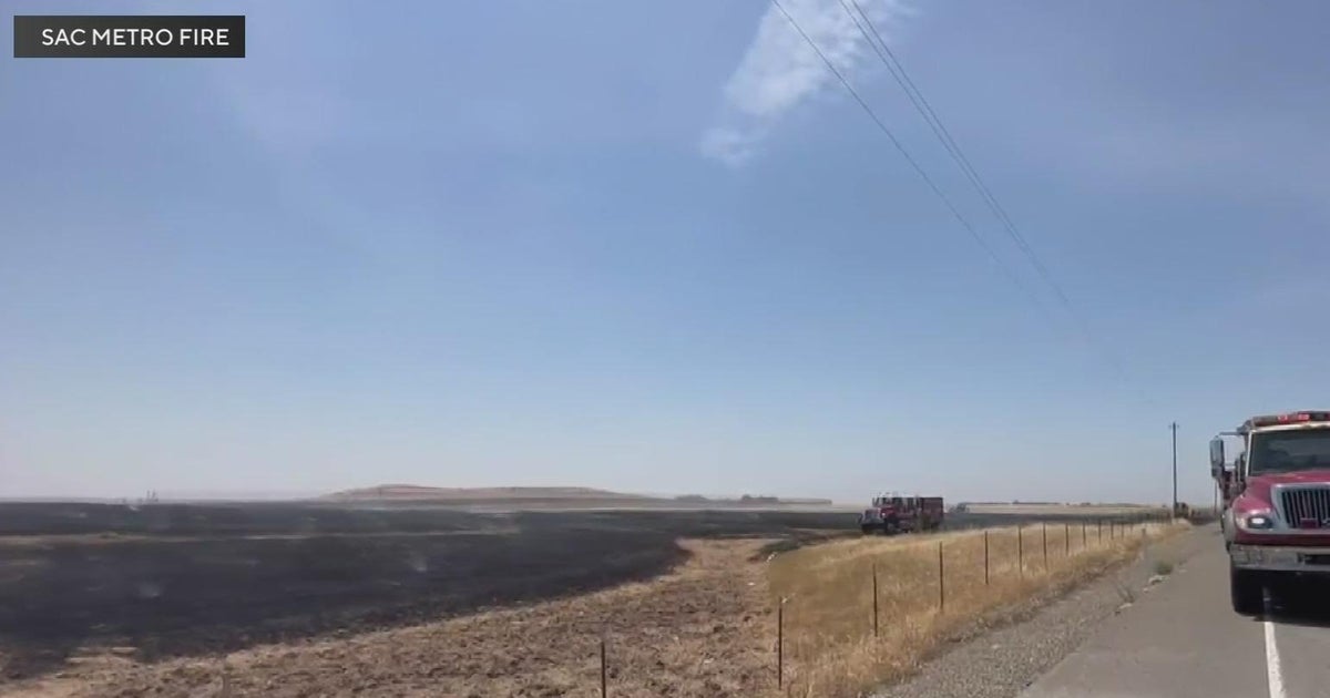 Grass fire along Grant Line Road stopped at just 2 acres - CBS Sacramento