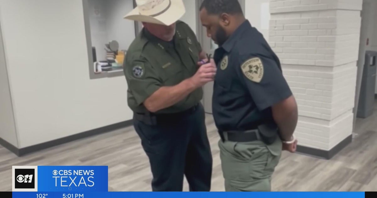 Video shows Ellis County Sheriff Brad Norman cutting patch off fired ...