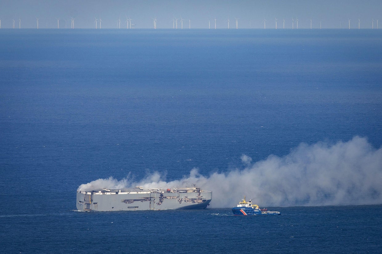 Deadly cargo ship fire still burning on vessel carrying 500 electric ...