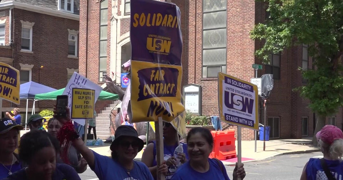 Nurses on strike picket outside Robert Wood Johnson University Hospital ...