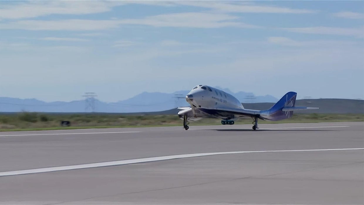 Virgin Galactic launches its first space tourist flight, stepping up ...