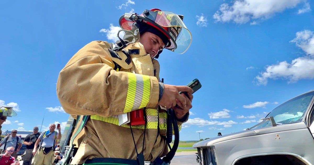 Firefighter creates EV Rescue app for safety guides - CBS News