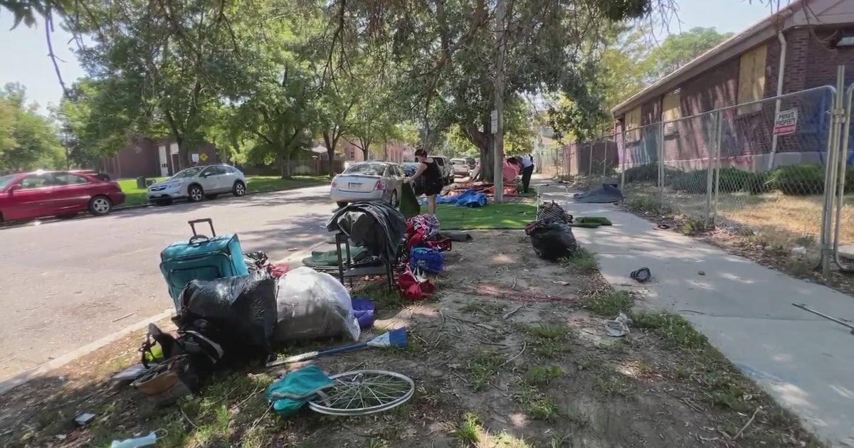 Crews cleanup homeless camp at 18th and Logan days after 2 people shot ...