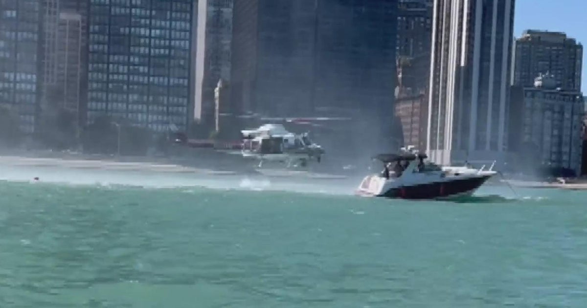 Man, 25, hospitalized after crews rescue him in Lake Michigan's ...