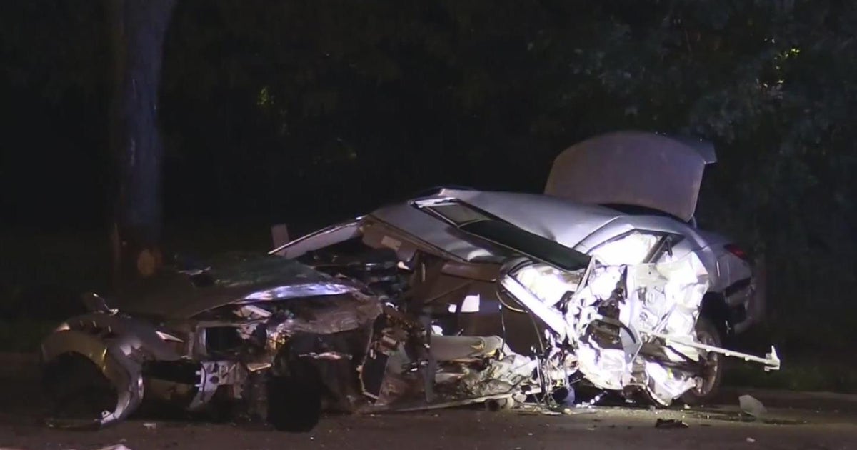 Crumpled car left in Englewood after driver hits tree - CBS Chicago