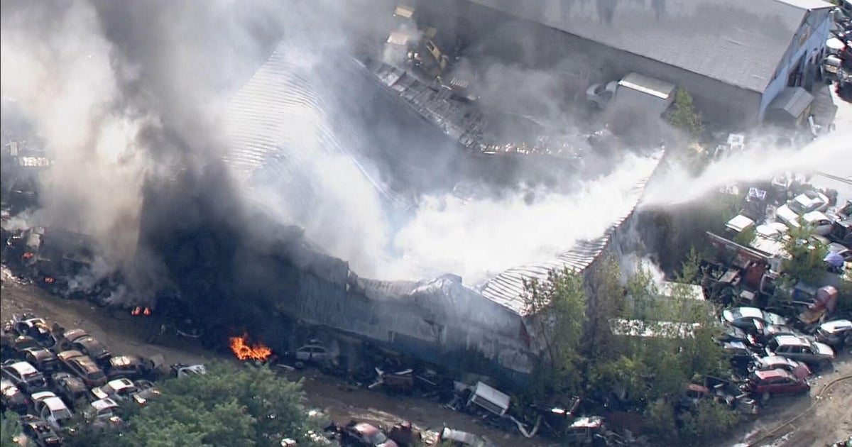 Injuries reported after massive fire at junkyard in Billerica - CBS Boston