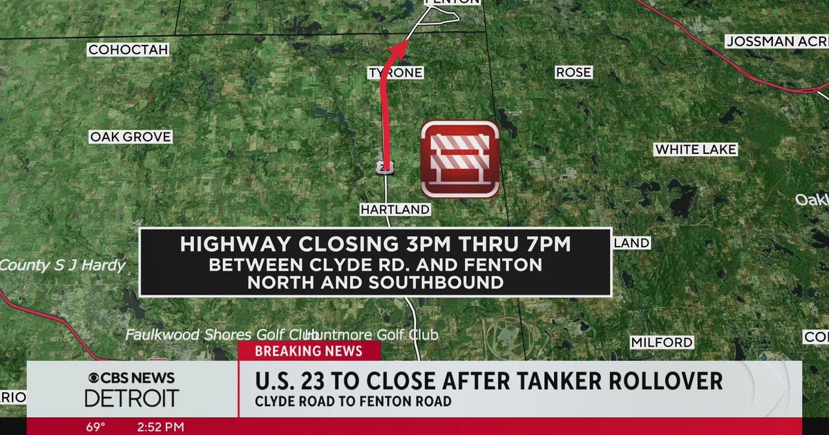 Tanker truck carrying sulfuric acid overturns on US-23, authorities say situation is under ...