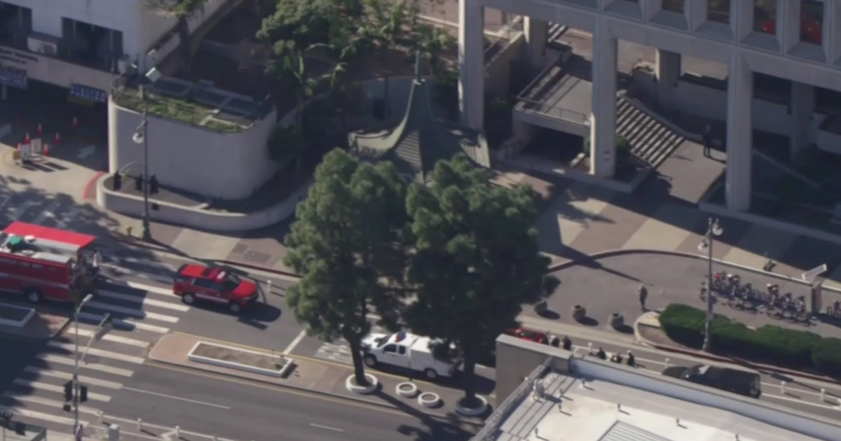 HazMat investigation causes partial evacuation after "unknown white ...