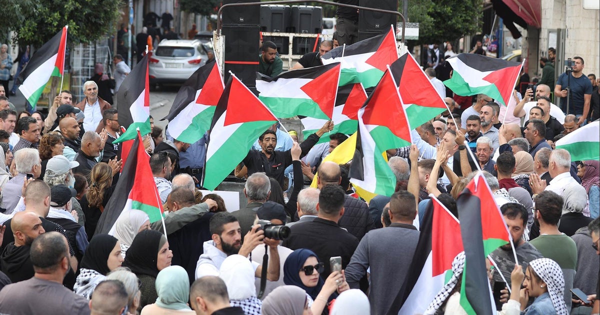 Shots fired as Palestinians in West Bank protest against Israel - CBS News