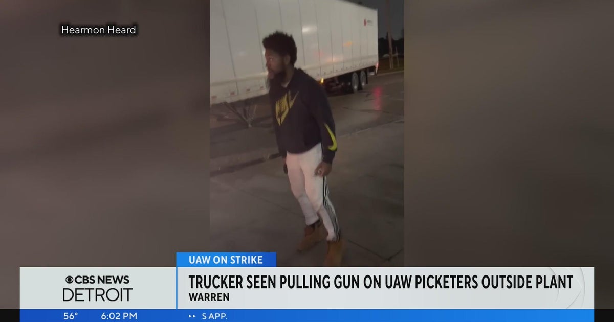 Truck driver pulls gun on striking UAW workers in Warren - CBS Detroit