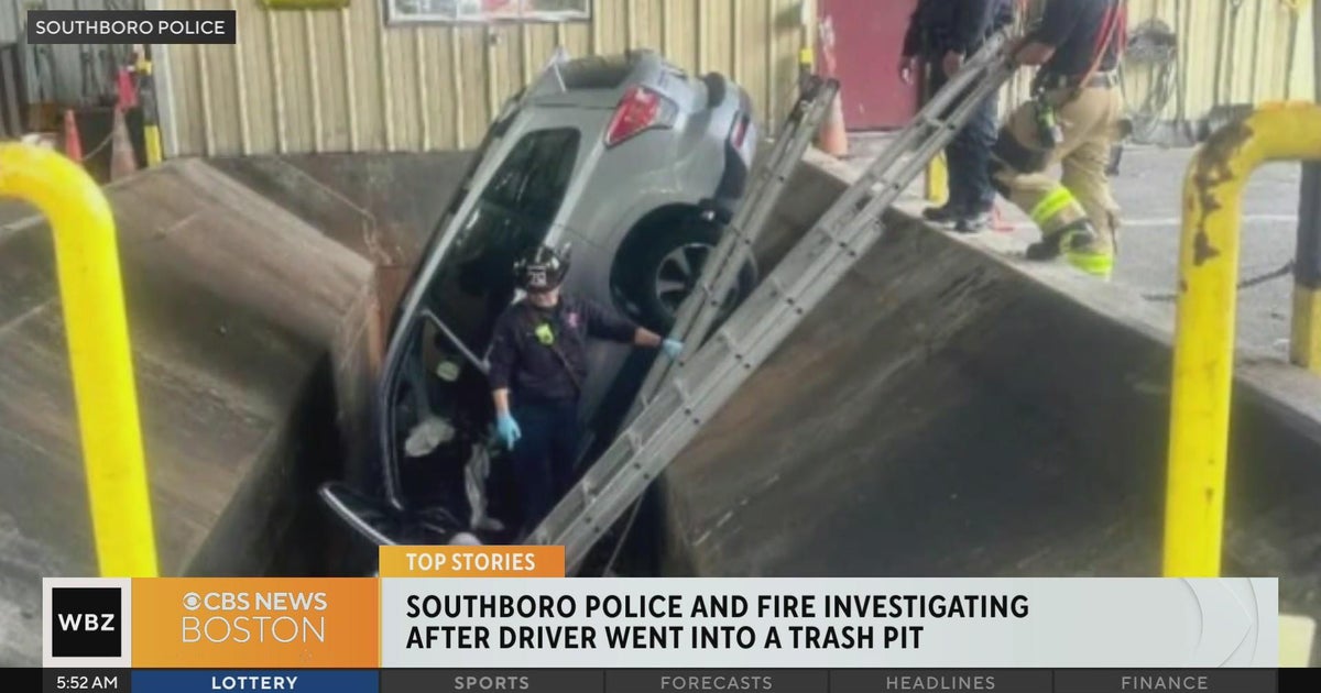 Car gets stuck in trash compactor at Southboro DPW - CBS Boston