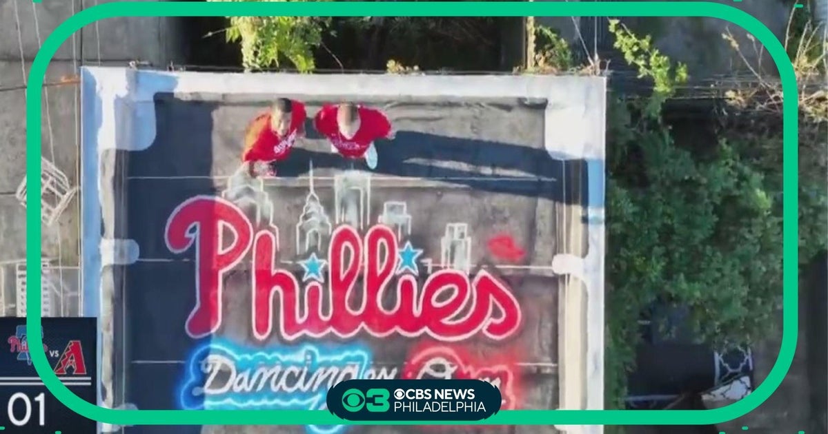 Philadelphia roofer and artist team up to paint the city red with ...
