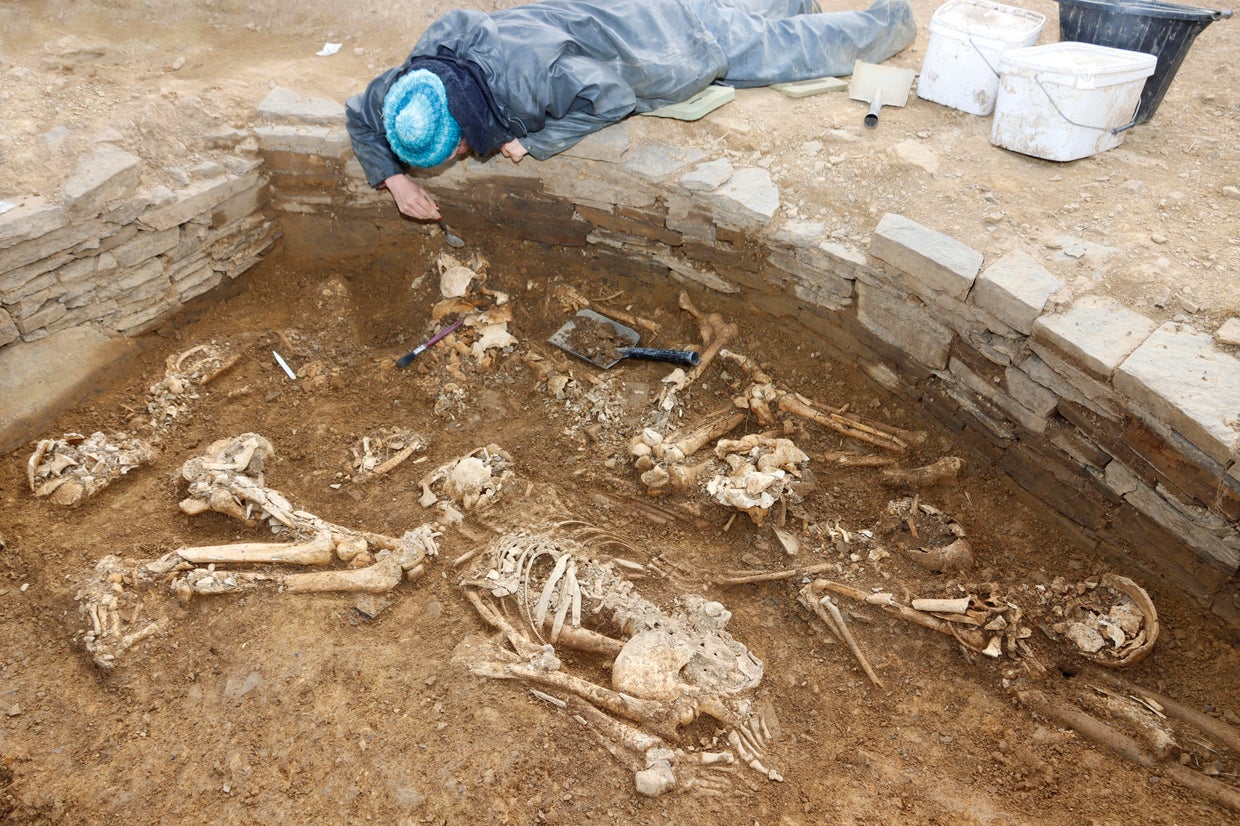 Skeletons discovered in "incredibly rare" 5,000-year-old tomb in ...