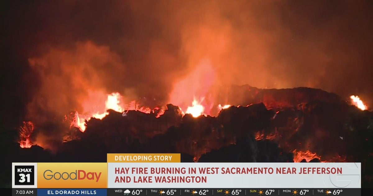 Firefighters monitoring hay fire in West Sacramento - CBS Sacramento
