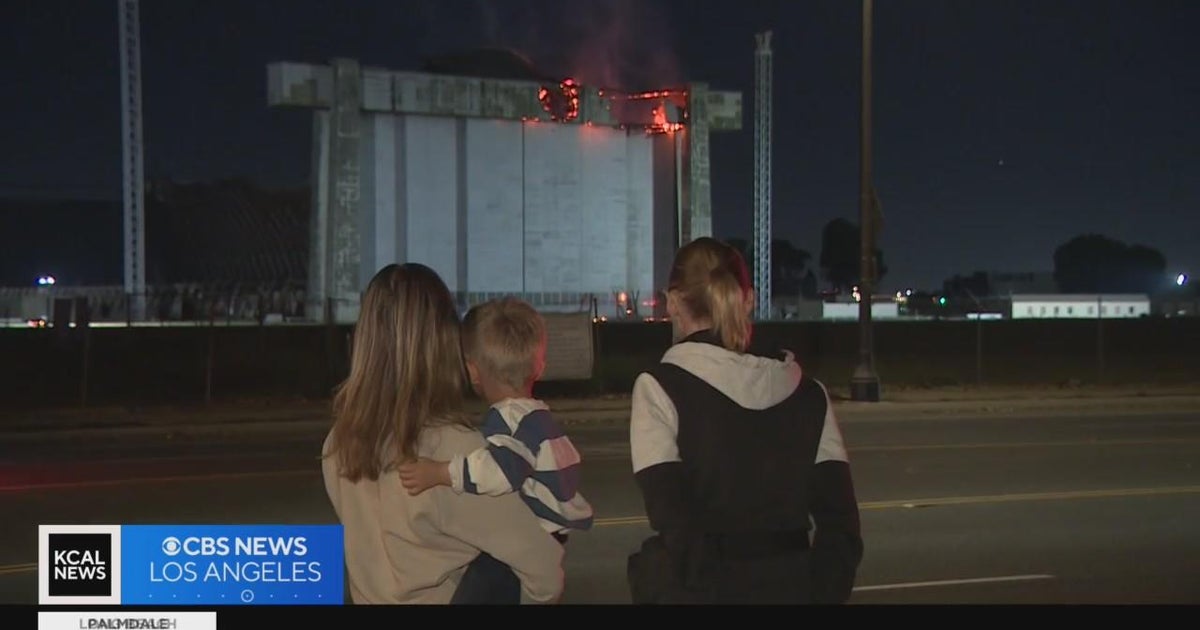 Hanger fire flare up in Tustin prompts school closures - CBS Los Angeles