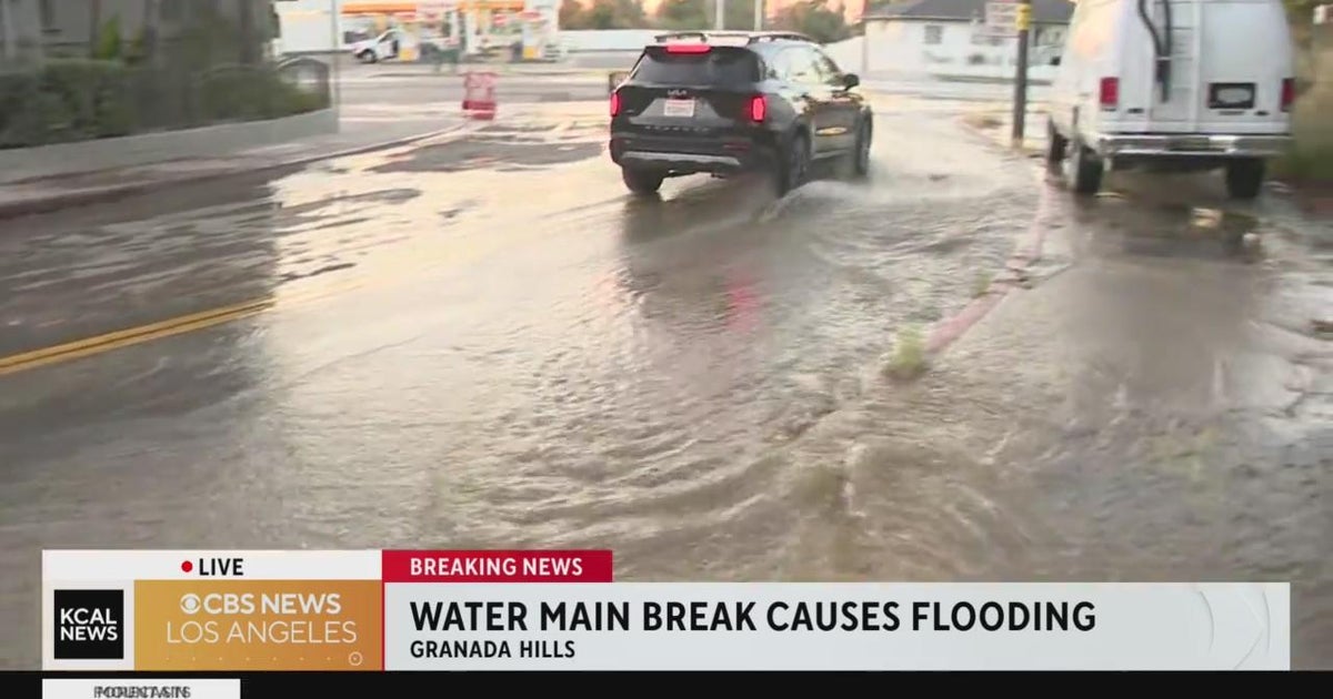 Water main break causes flooding in Granada Hills - CBS Los Angeles