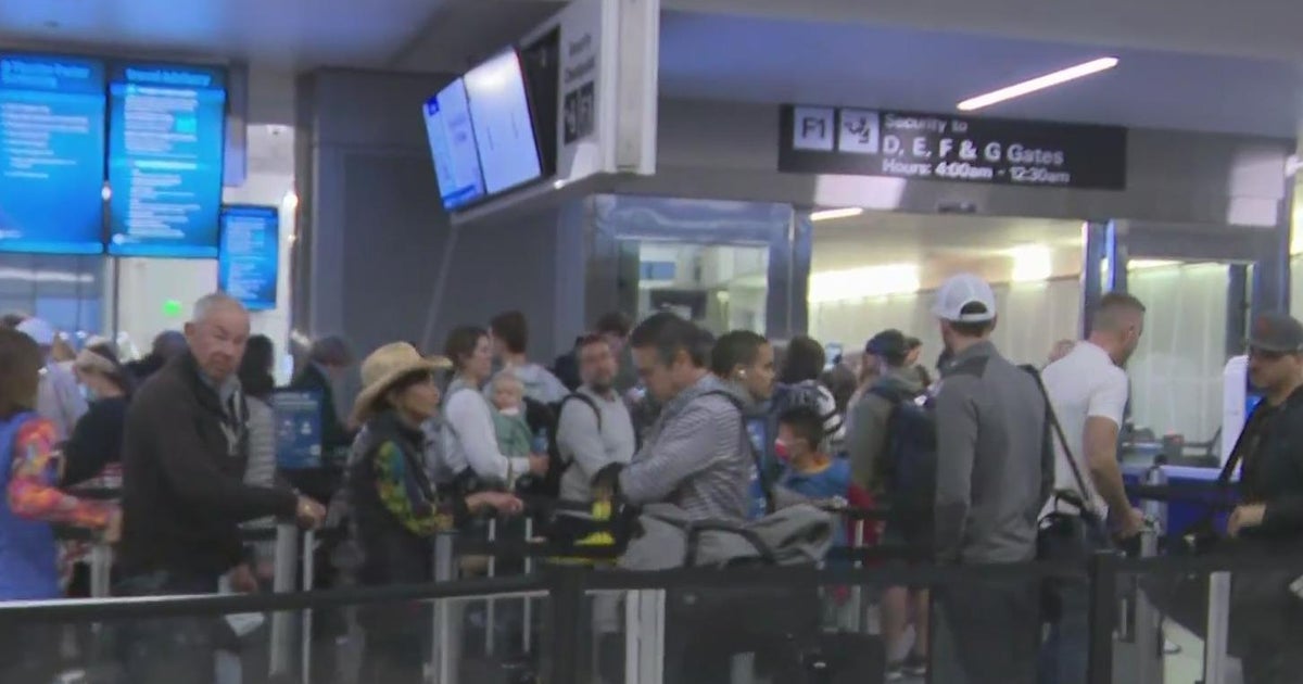 Passengers packing airports for holiday rush and hopefully packed some patience, too - CBS San ...