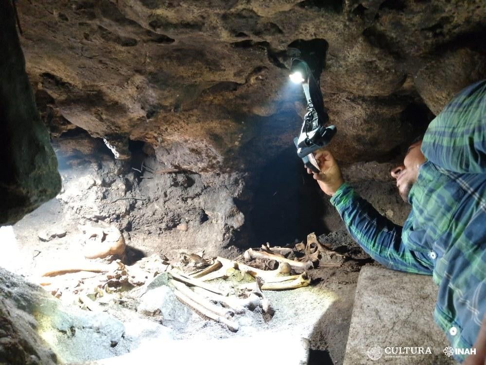 A boulder blocking a Mexican cave was moved. Hidden inside were human ...