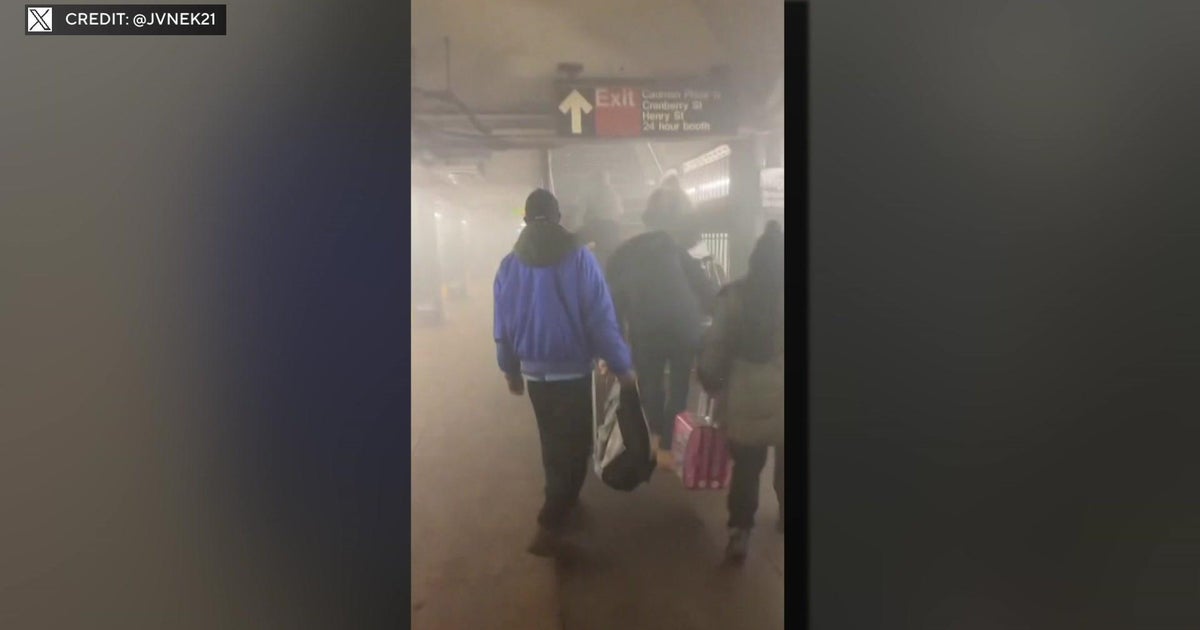 Four injured after fire sparks under subway tracks in Brooklyn - CBS ...