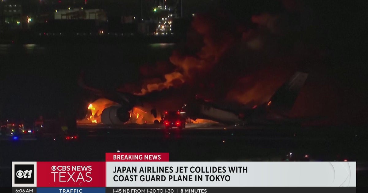 Japan Airlines jet collides with coast guard plane in Tokyo - CBS Texas