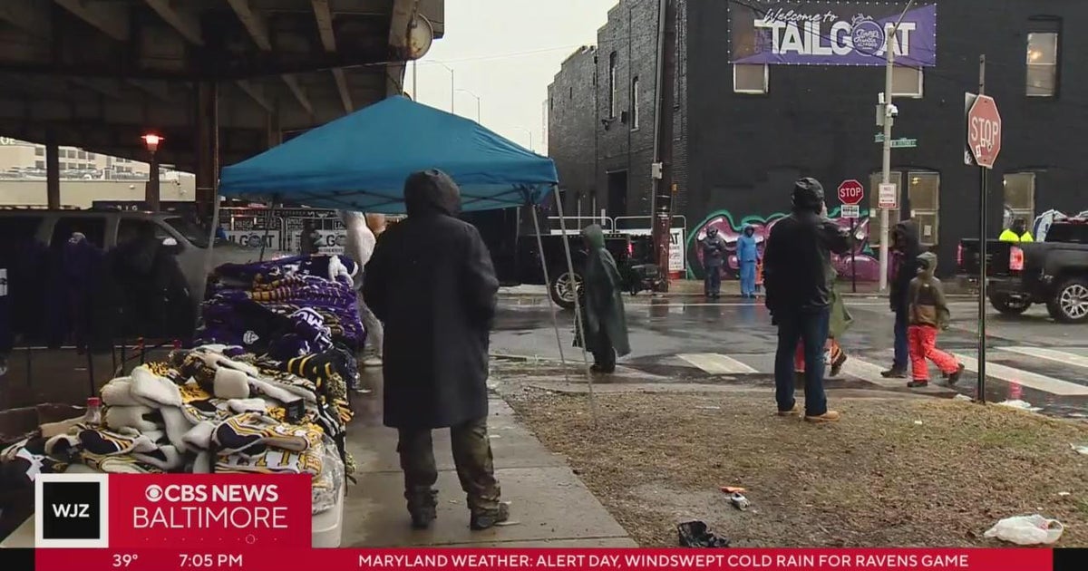Die-hard fans brave cold, rainy, windy conditions at Ravens' regular ...
