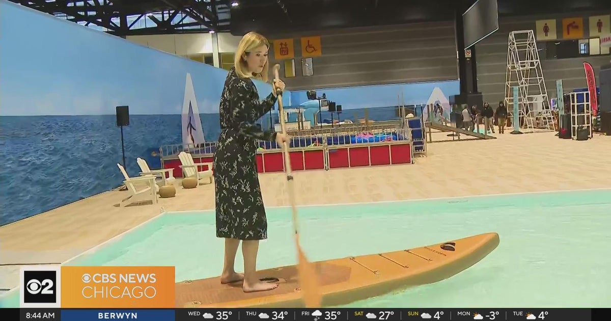 Jackie Kostek paddles around at the Chicago Boat Show - CBS Chicago