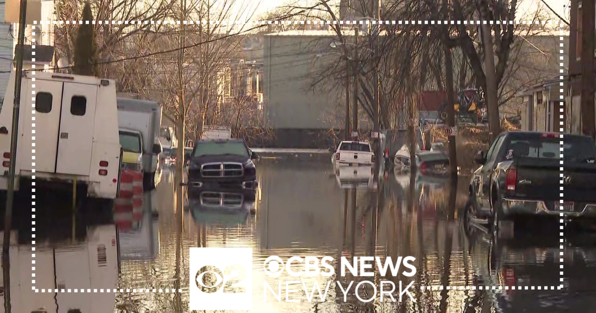 Residents evacuated as floodwaters reach Paterson home - CBS New York