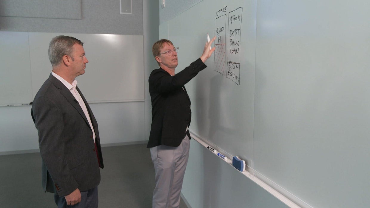 Owners saddled with half-empty office buildings as hybrid work trend ...