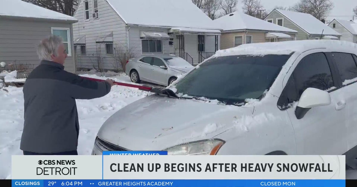 Clean up begins after heavy snowfall - CBS Detroit