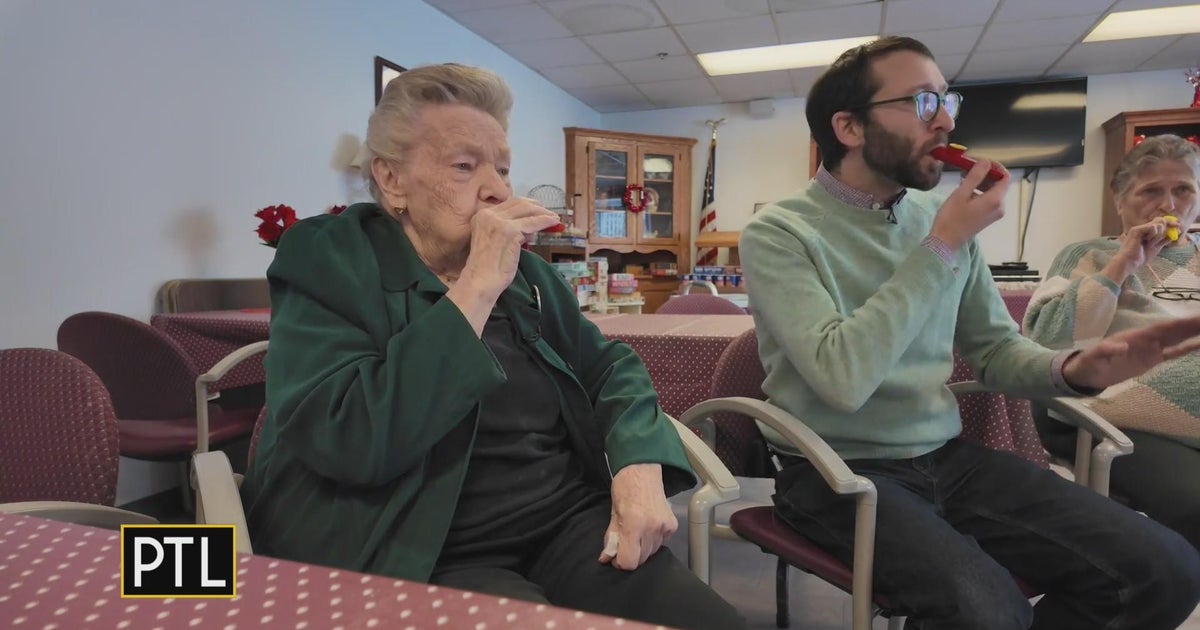 Longtime PTL fan Betty plays the kazoo with Boaz - CBS Pittsburgh