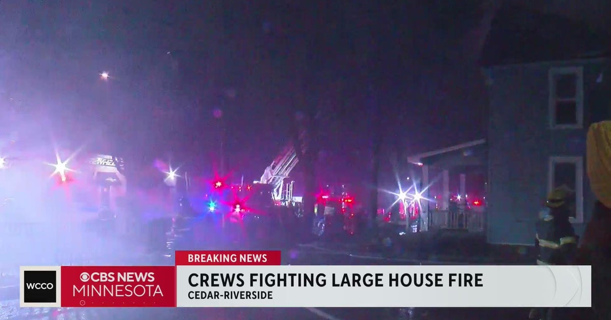 Crews battling fire that spread from dumpster to home in south ...